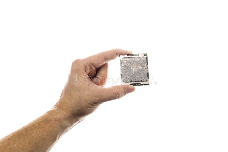 CPU with Old Thermal Paste on IHS in Man`s Hand Isolated on White ...
