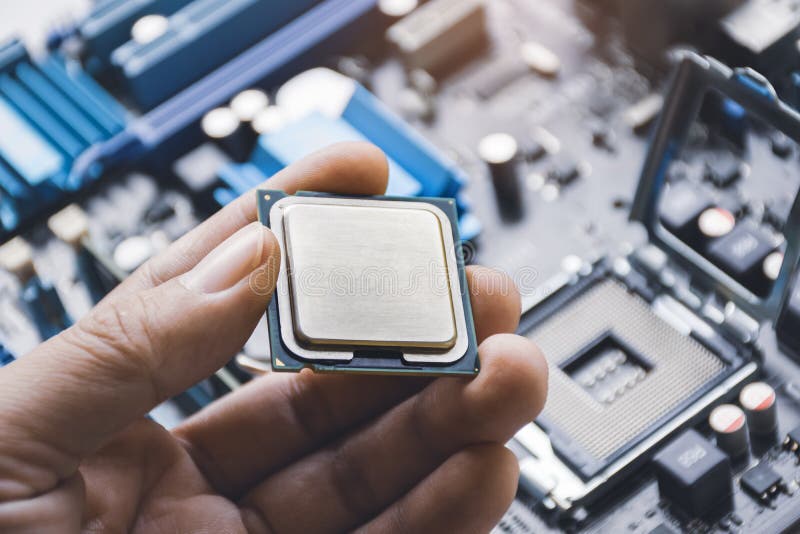 Technician Hand Insert RAM Memory To Memory Slot on Computer ...