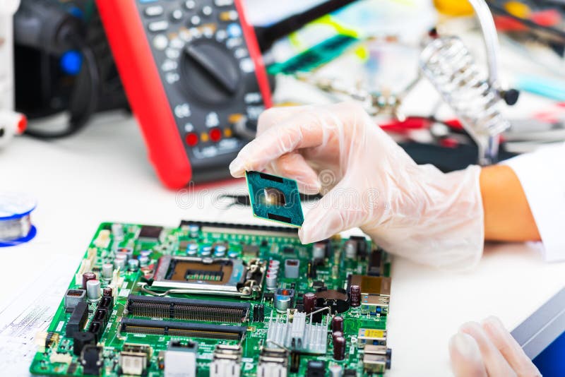CPU in hand stock photo. Image of motherboard, array - 17079926