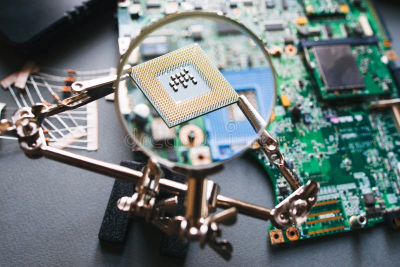 Cpu Processor through a Magnifying Glass. Stock Photo - Image of ...