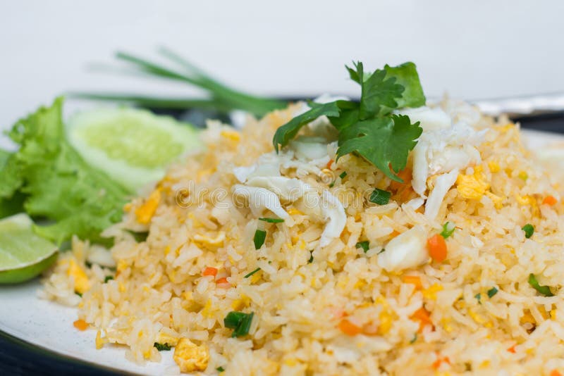 Crab Fried Rice in White Dish on Table Stock Image - Image of carrot ...