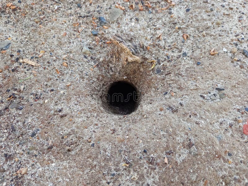Crab Hole in the Sand. Sand Bottom with Hole Aerial View Stock Photo ...