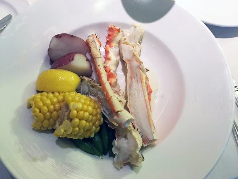 Crab Legs for Dinner in White Plate Stock Image - Image of tasty ...
