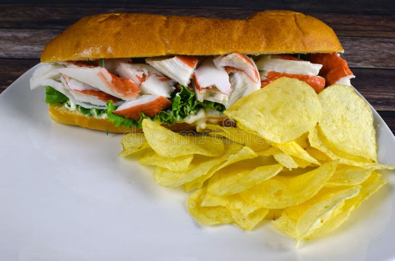 Crab Meat Sub Served with a Side of Potato Chips Stock Photo - Image of ...