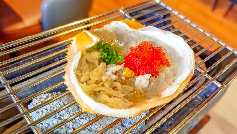 Crab Paste in Crab Shell Grilled on Rack and Oven on the Table in ...