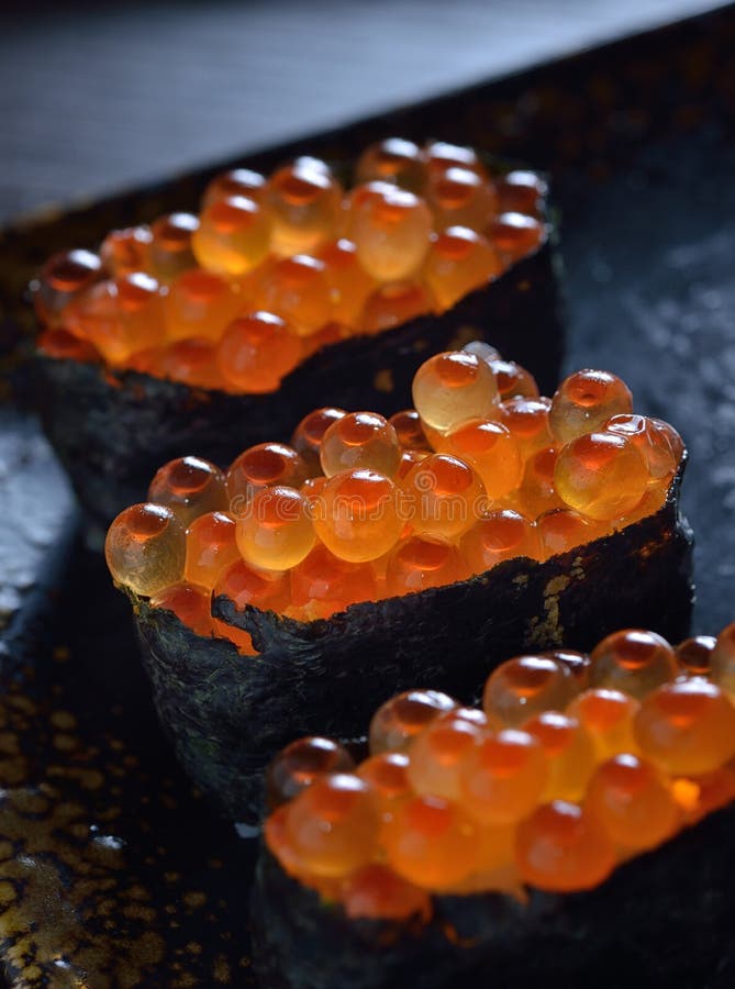 Raw Crab roe sashimi stock photo. Image of sake, glass - 72683620