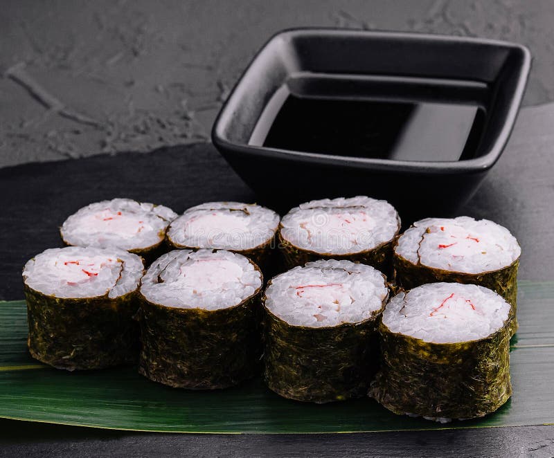 Crab Stick Maki Sushi on Black Tray Stock Photo - Image of board, rice ...