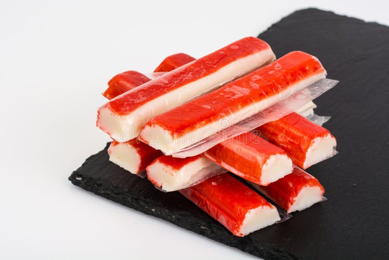 Crab Sticks in Plastic Packaging Stock Photo - Image of black ...