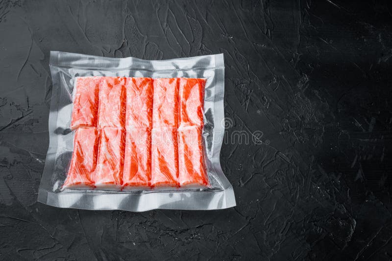 Crab Sticks in Vacuum Pack, on Black Background, Top View Flat Lay ...
