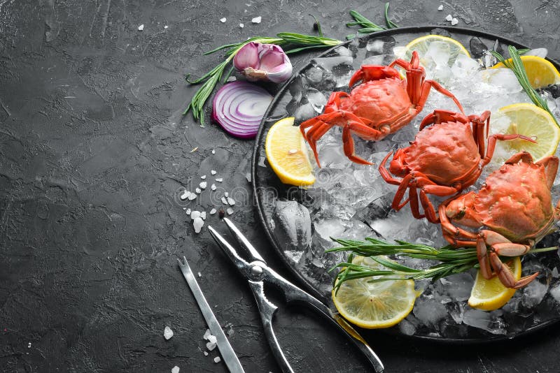 Crabs with Lemon on Ice. Top View Stock Image - Image of delicious ...