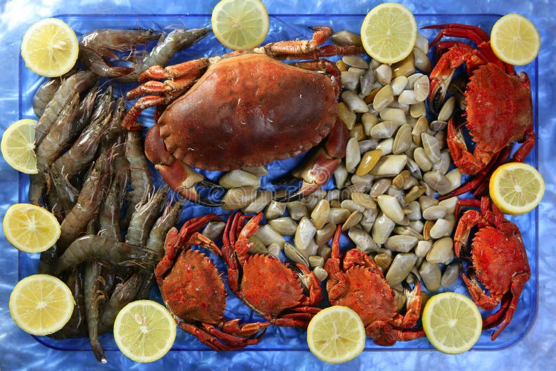 Crabs Tellin Shrimp Clams and Lemon Stock Photo - Image of gourmet ...