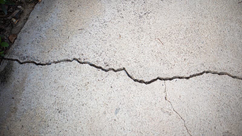 Crack in Concrete Surface the Image Shows a Close-up View of a Crack in ...