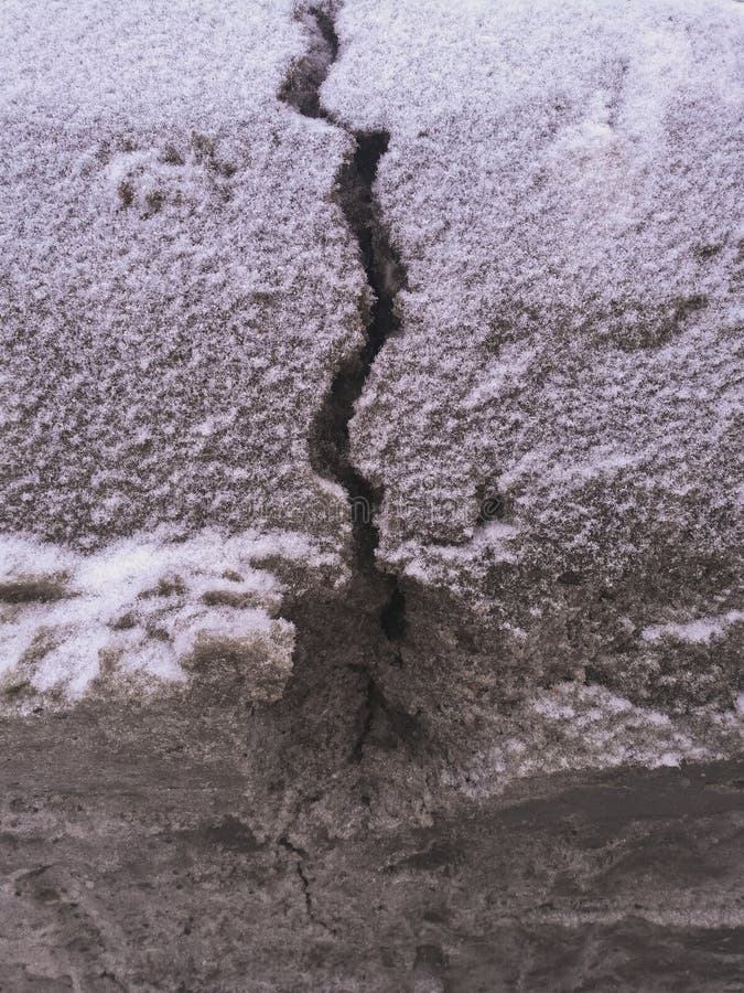 A crack in the snow stock image. Image of driveway, nature - 111803645