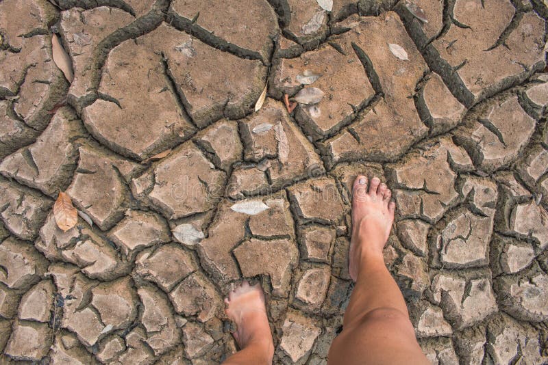 Foot on Crack ground stock image. Image of summer, dryness - 56391055