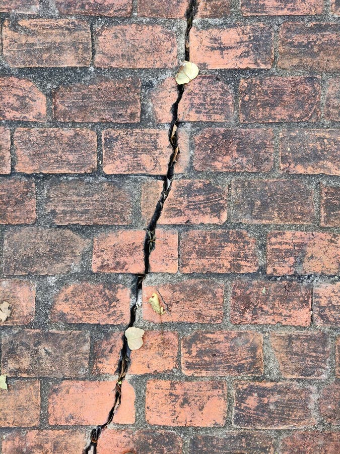 Crack in red brick wall stock image. Image of wall, brick - 378780791