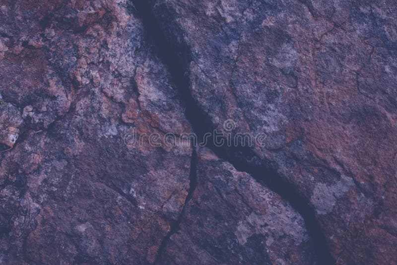 Crack in the Rock on Mountain in Purple Tone. Stock Photo - Image of ...
