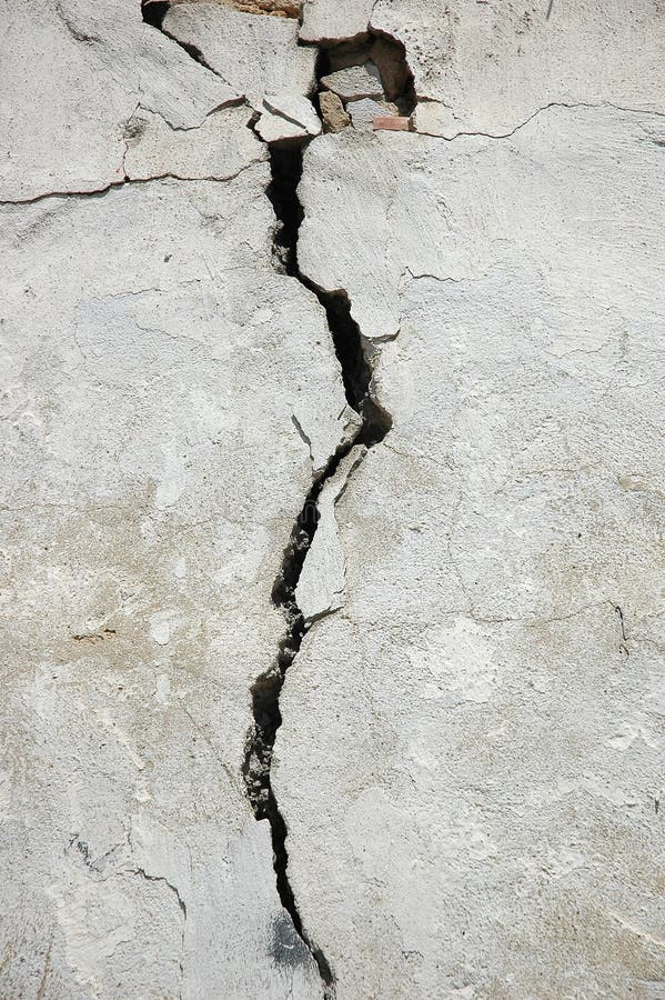 Crack in the stone wall stock photo. Image of material - 49784174