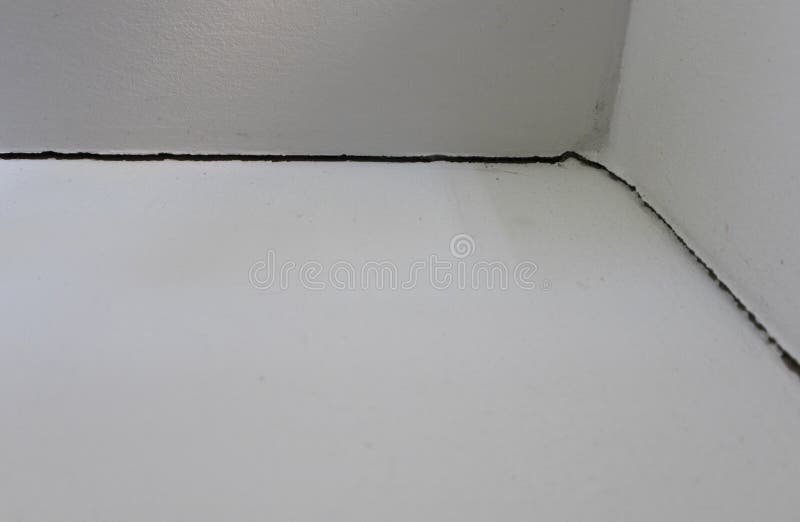 A Crack on the wall corner stock photo. Image of background - 250551376