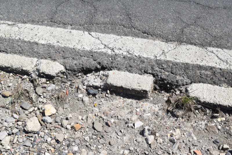 Badly Broken Edge of the Road Stock Photo - Image of pothole, small ...