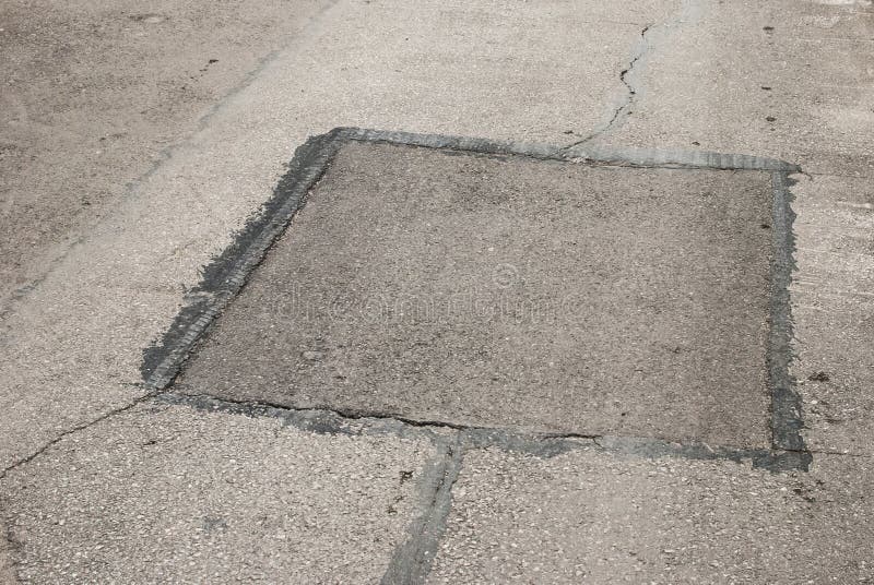 Repair asphalt patch stock image. Image of repairing - 216926269