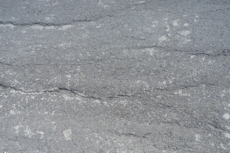Cracked Asphalt Texture: Close-up of Road Surface Stock Photo - Image ...
