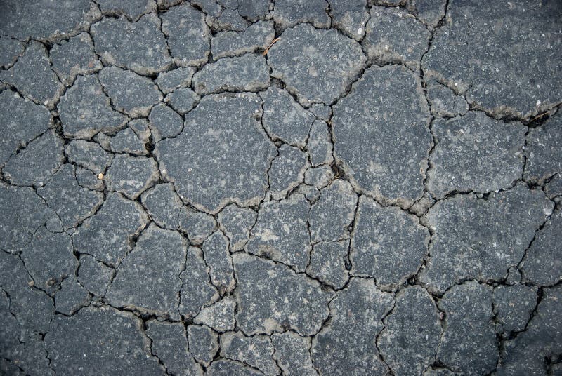 Cracked blacktop surface stock photo. Image of dirt, roadway - 9934758