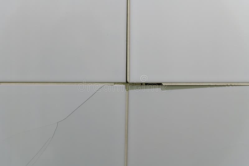 Cracked, Broken Bathroom Wall Tiles or Panels - Closeup View Stock ...