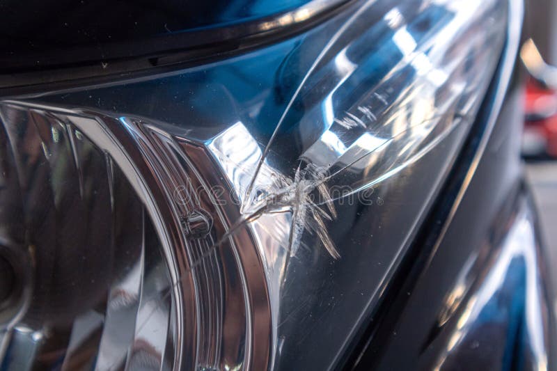 Cracked or Broken Motorcycle Headlight Glass Stock Photo - Image of ...