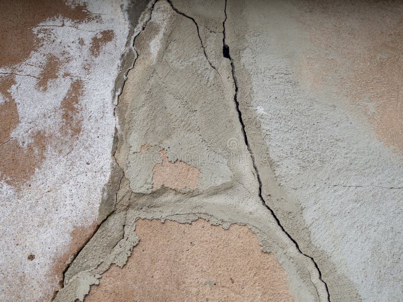 Cracked Building Stone Wall with Fractured Plaster Covering Tex Stock ...