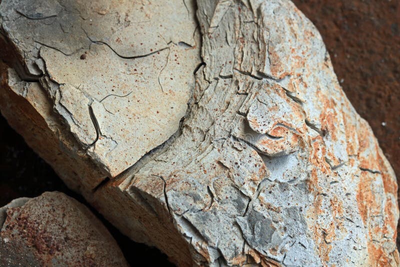 Cracked Burnt Out Grey Coal with Rust Colored Marks Stock Image - Image ...