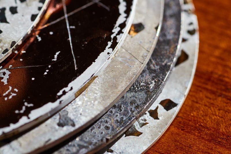 Cracked and Chipped Hard Drive CDs after Burning with Textured Surface ...