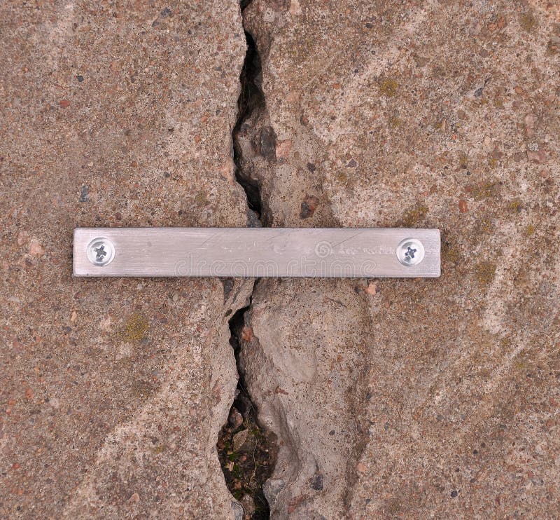 Cracked Concrete and Metal Part Stock Image - Image of gritty, debris ...