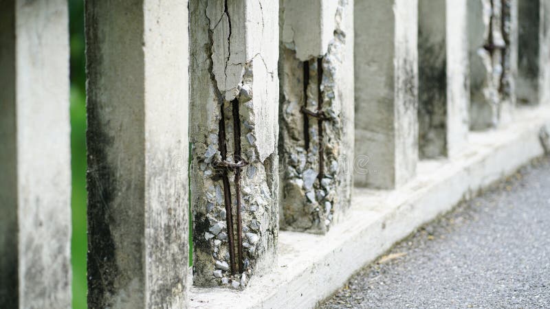 Cracked Concrete Surface with Visible Rusty Reinforcement of Bridge ...
