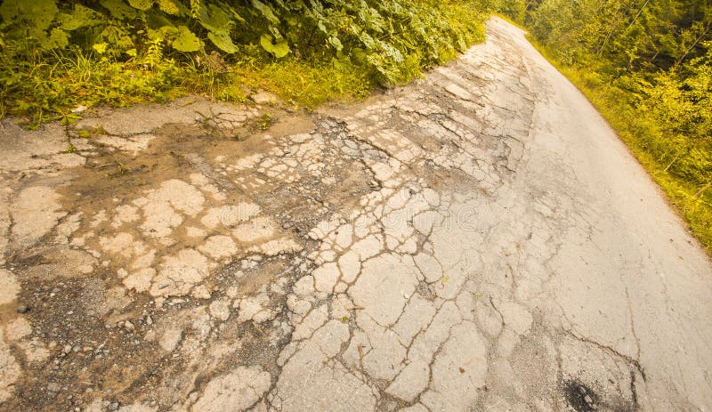 Cracked Damaged Road in the Autumn Stock Photo - Image of direction ...