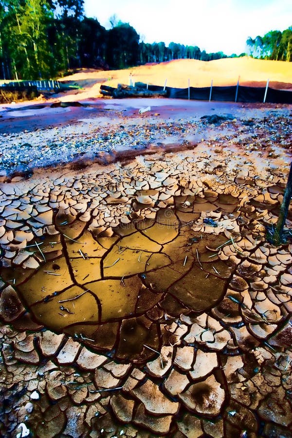 Cracked dried up brown mud stock image. Image of dried - 255186745