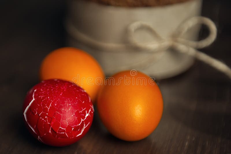 Cracked Easter Egg with Other Colored Eggs and Easter Cake on Wooden ...