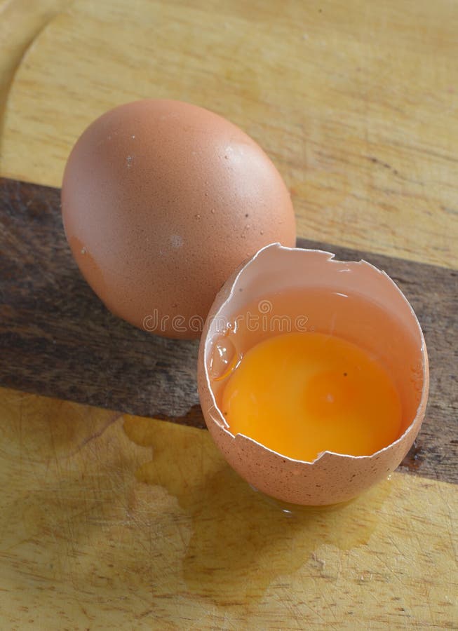 Cracked eggs stock image. Image of eggs, yellow, objects - 36433571