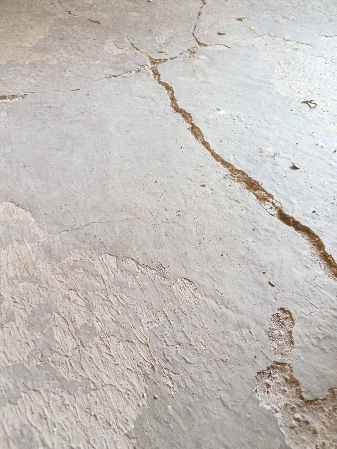 Cracked floor in the house stock photo. Image of white - 264003566