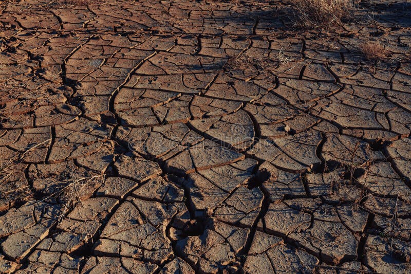 Cracked ground in desert stock image. Image of crack - 276107955