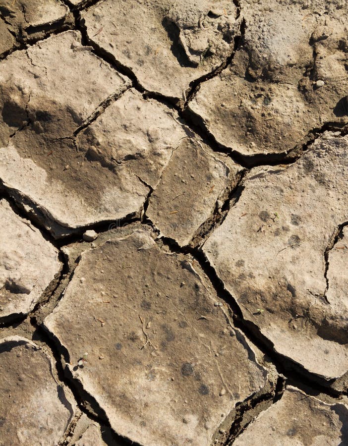 Cracked ground on a field stock image. Image of damage - 172783627