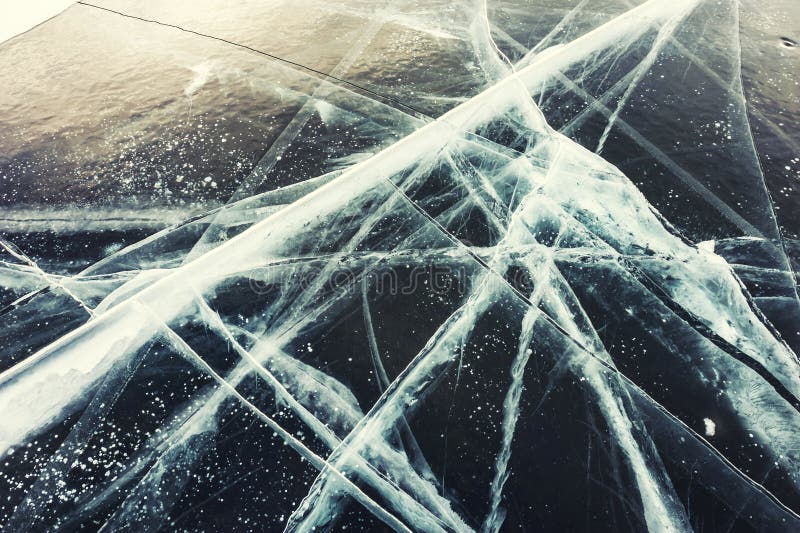 Cracked ice on the lake. stock photo. Image of lake, clear - 67303056