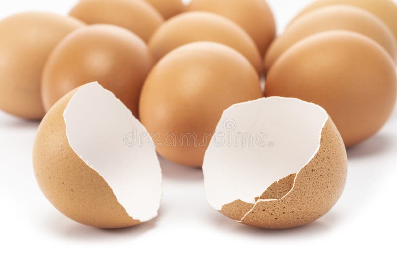 A Cracked and Open Egg in Front of Other Eggs Stock Photo - Image of ...