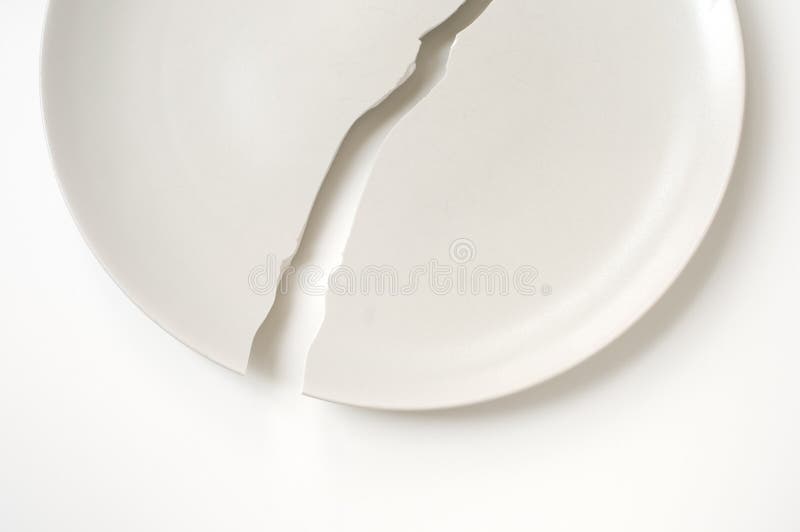 Cracked Plate on a White Table Stock Photo - Image of space, utensil ...