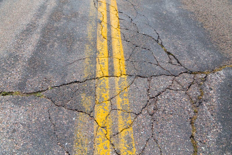 Cracked road I stock image. Image of pavement, foundation - 1075253