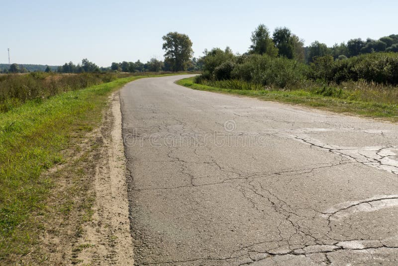 Cracked Rural Road stock photo. Image of outdoors, summer - 70169794