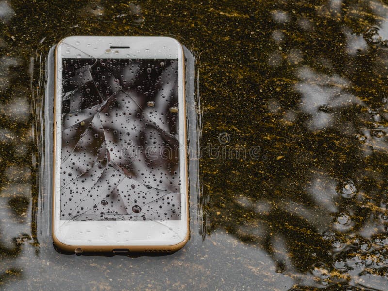 Cracked Screen and Wet Smart Phone Dropped Stock Image - Image of ...