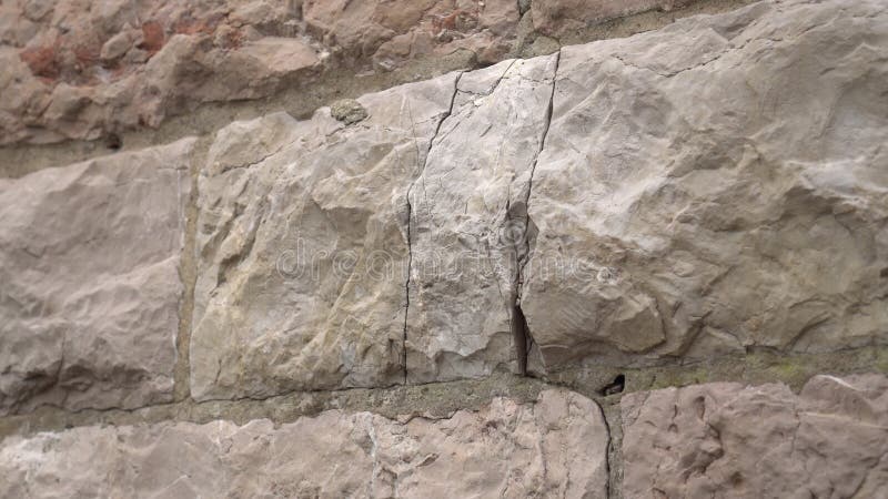 Cracked Stone Wall of an Abandoned Building Close Up. Stock Video ...