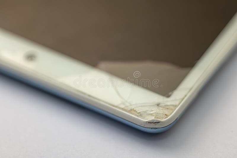 Cracked Tablet Corner stock photo. Image of cost, impact - 346312654