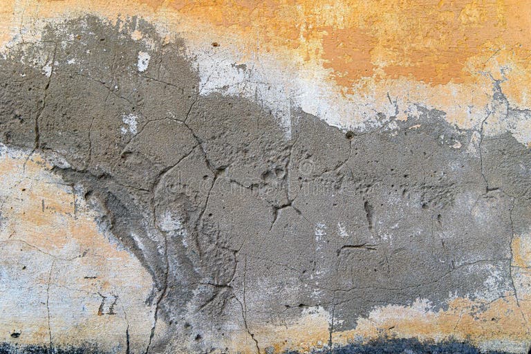 Cracked and Weathered Plaster Wall Texture. Close-up of a Cracked and ...