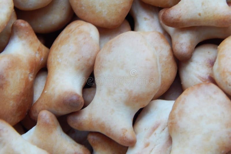 Cracker in the Shape of a Fish Close-up. Background, Texture Stock ...